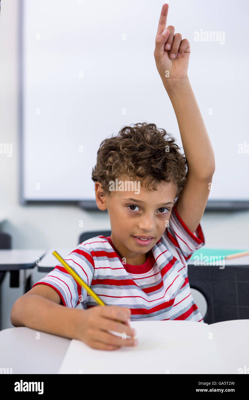 Boy raising hand in classroom hi-res stock photography and images - Alamy Boy raising hand in classroom hi-res stock photography and images - Alamy