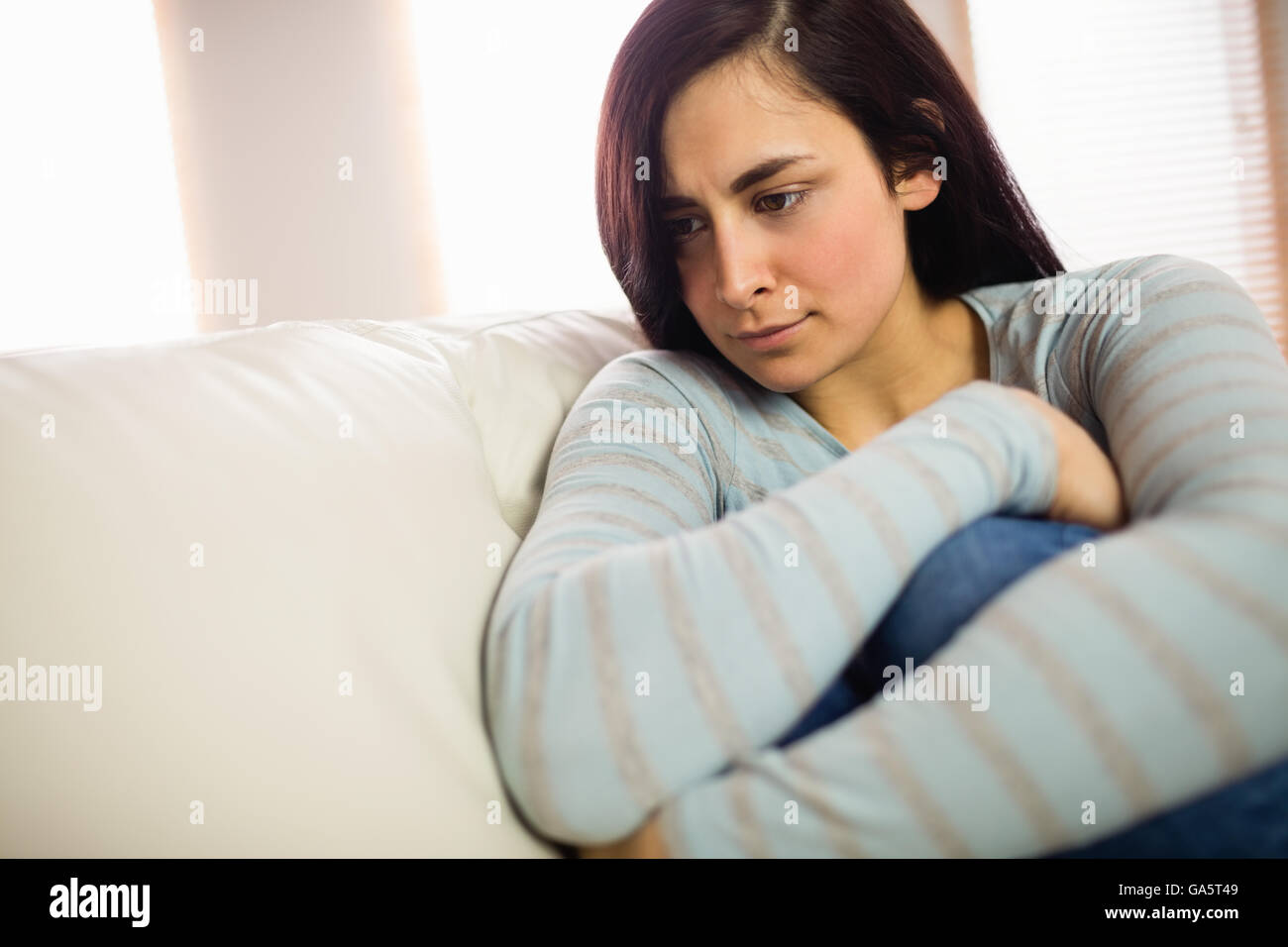 Home thinking sad woman hi-res stock photography and images - Alamy