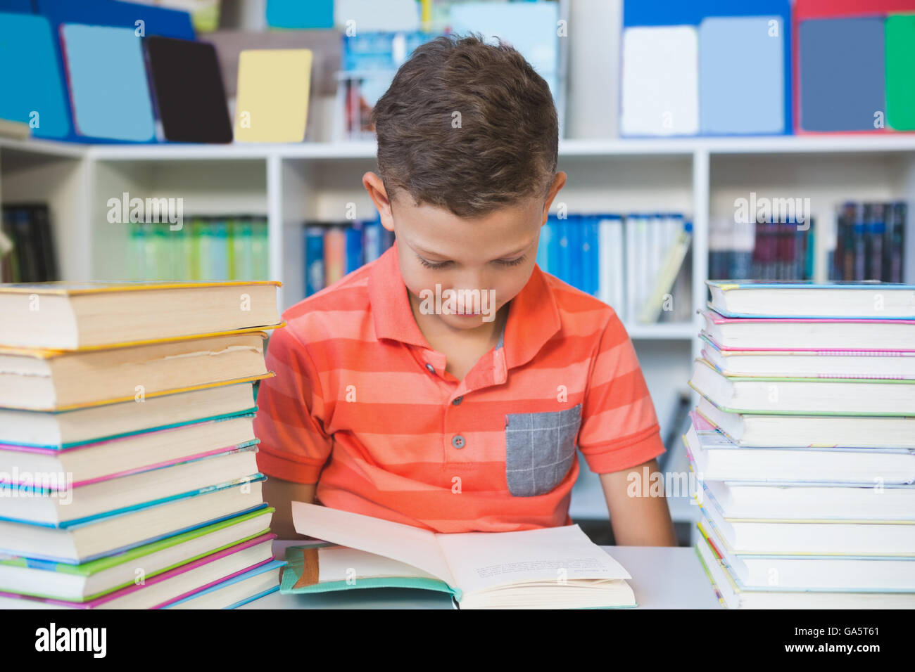 Schoolboy learning at the table hi-res stock photography and images - Alamy