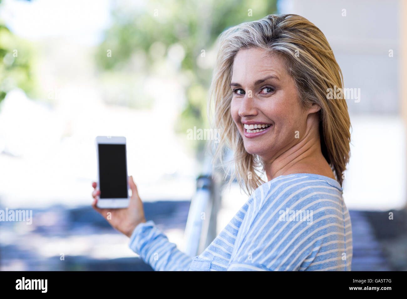 Holding street hi-res stock photography and images - Alamy
