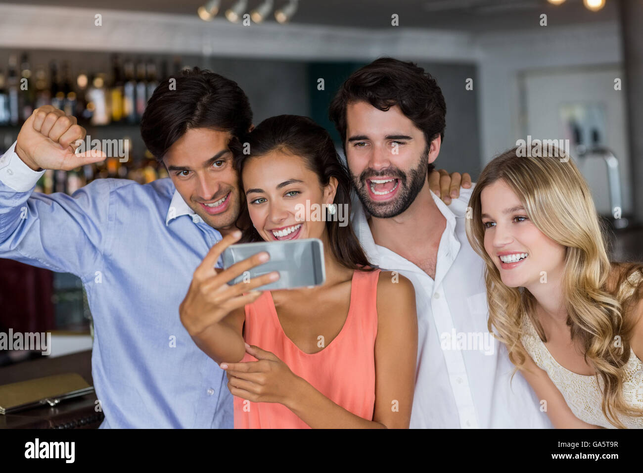 Group of friends taking a selfie Stock Photo - Alamy