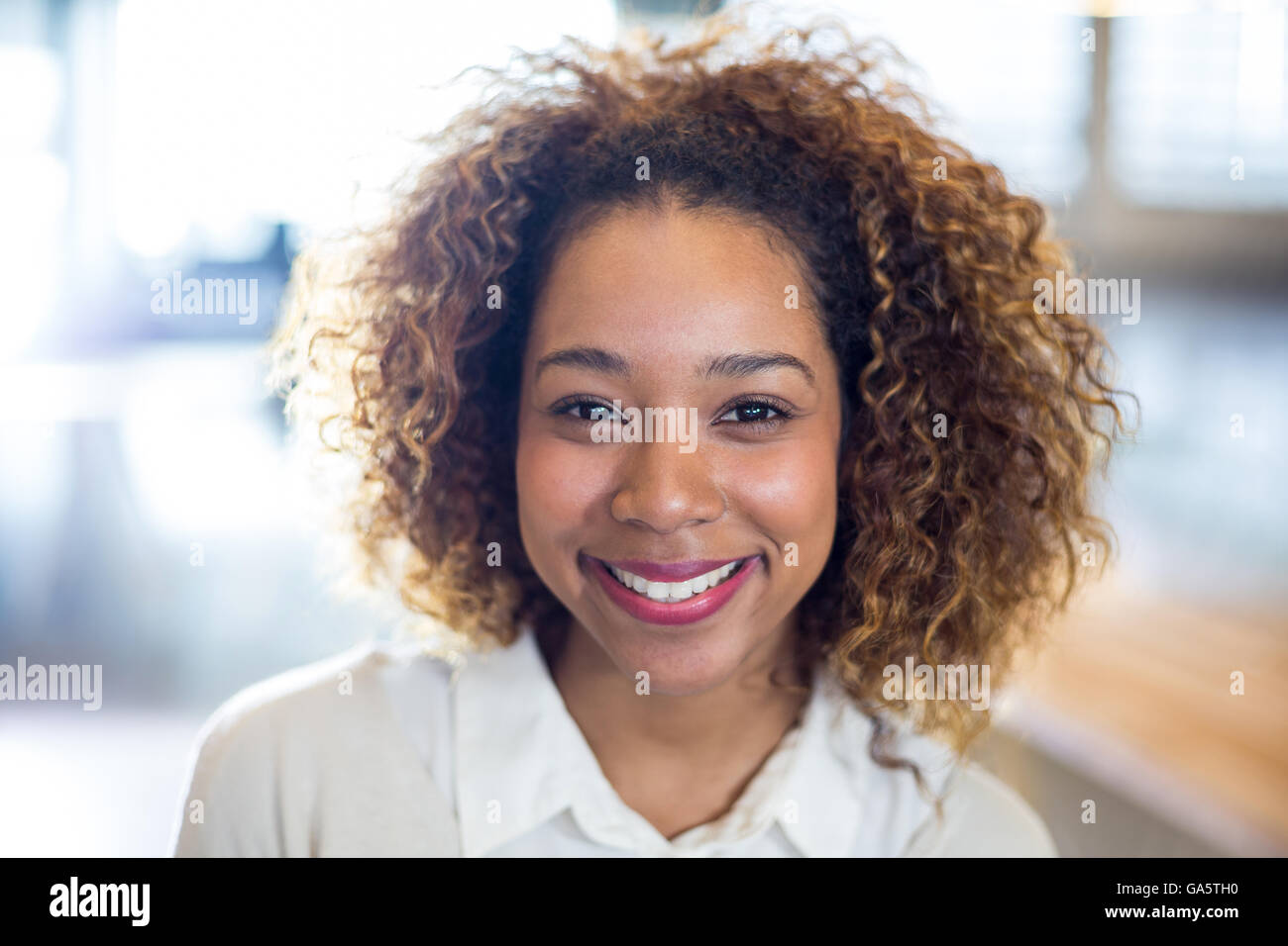 Portrait of smiling woman Stock Photo - Alamy