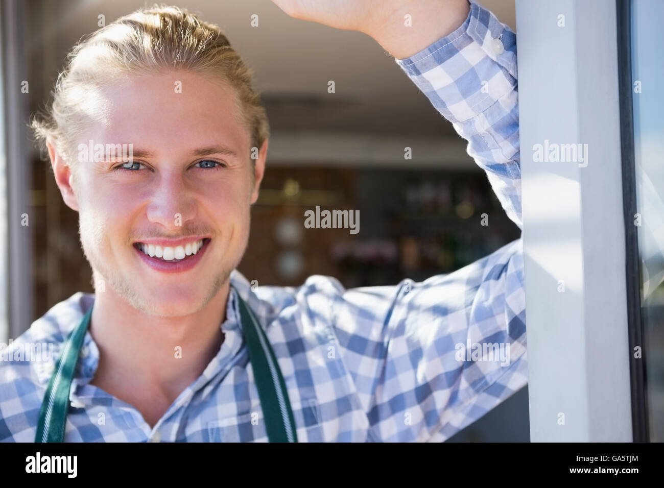 Portrait of waiter smiling Stock Photo - Alamy