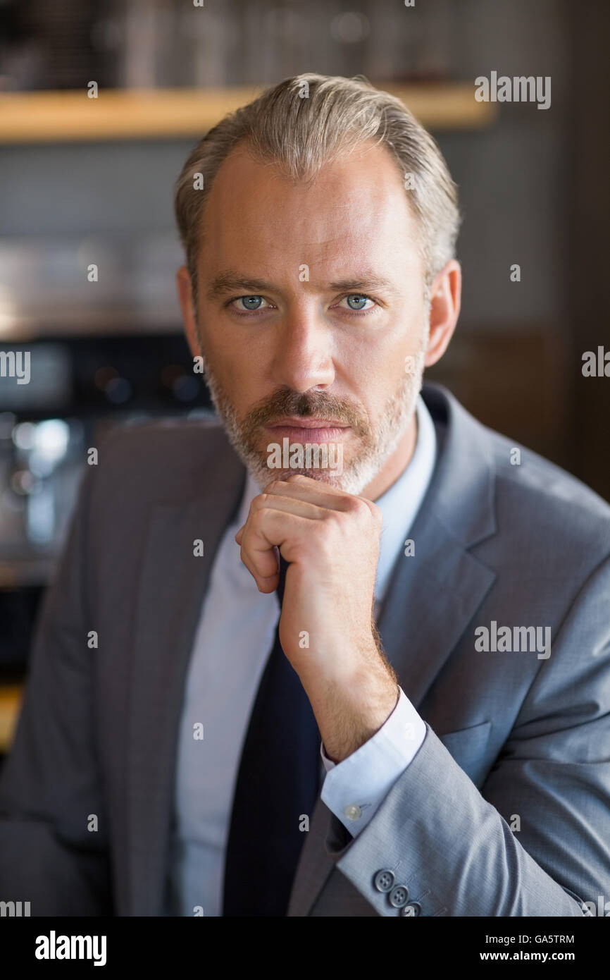 Portrait of confident businessman Stock Photo - Alamy