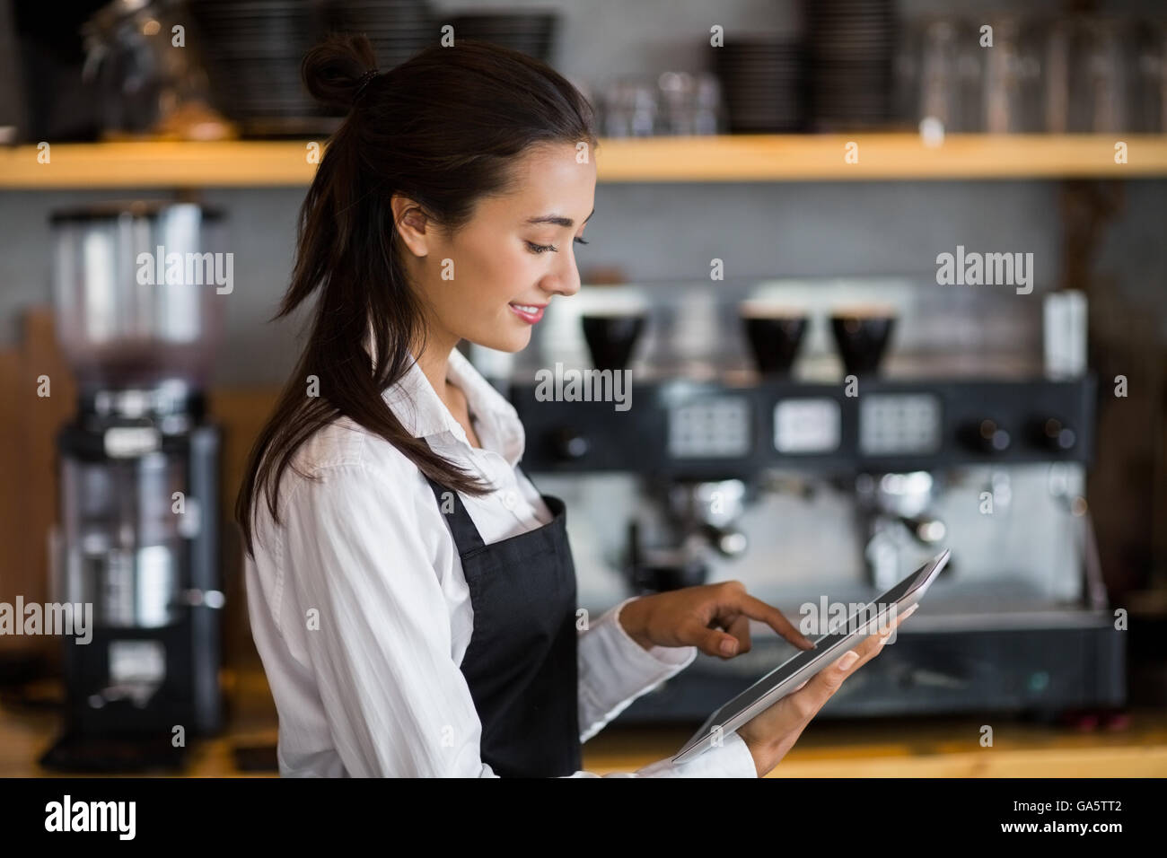Attractive young waitress using hi-res stock photography and images - Alamy