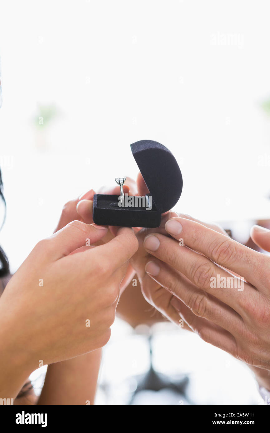 Man giving engagement ring to woman Stock Photo - Alamy