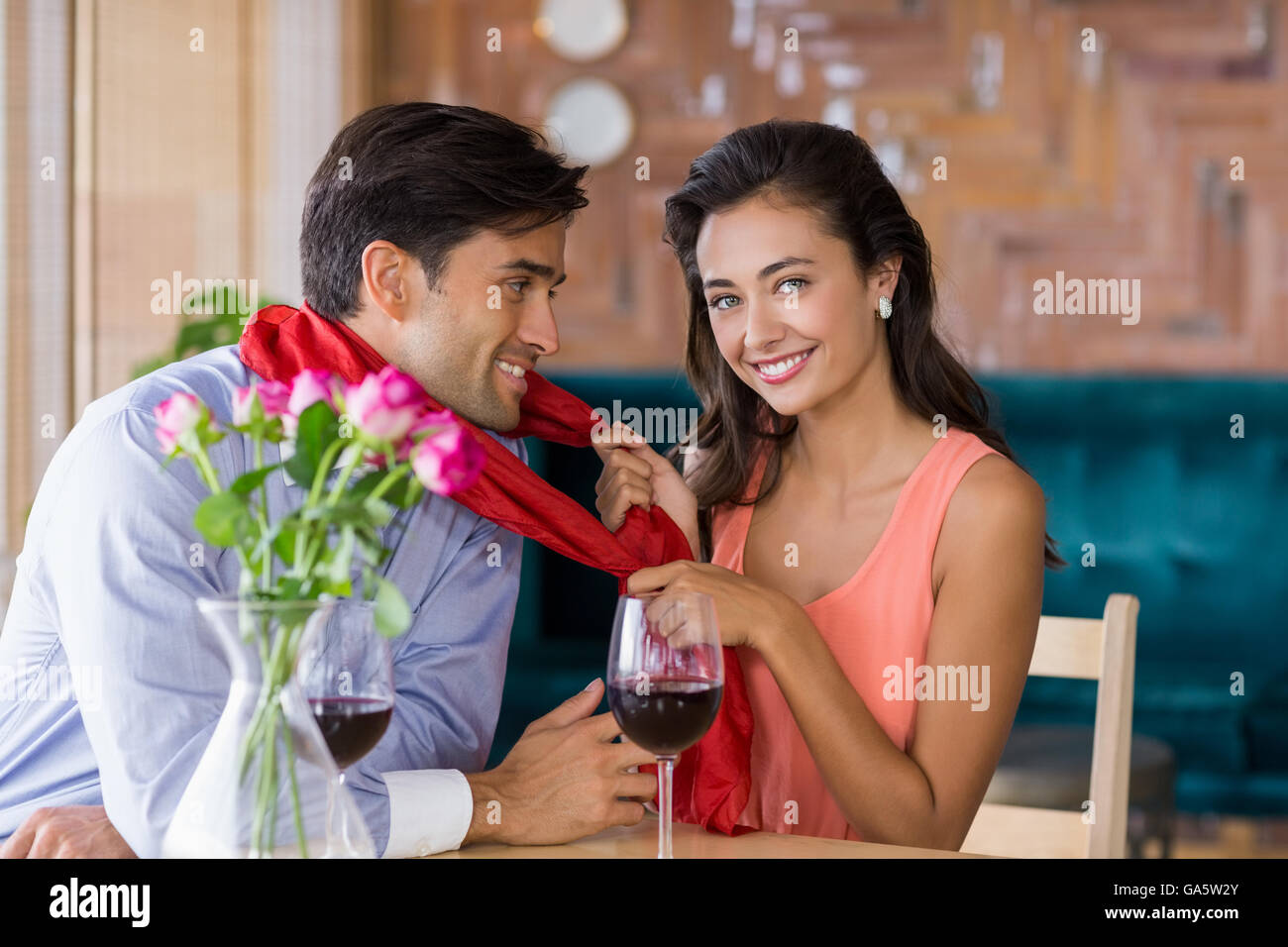 Couple having fun together in restaurant Stock Photo - Alamy