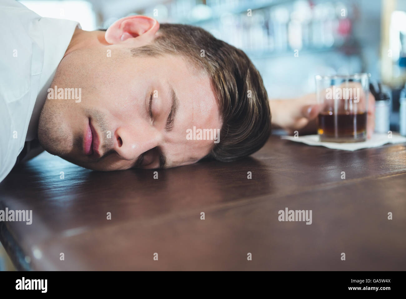 Alcohol sleeping hi-res stock photography and images - Alamy