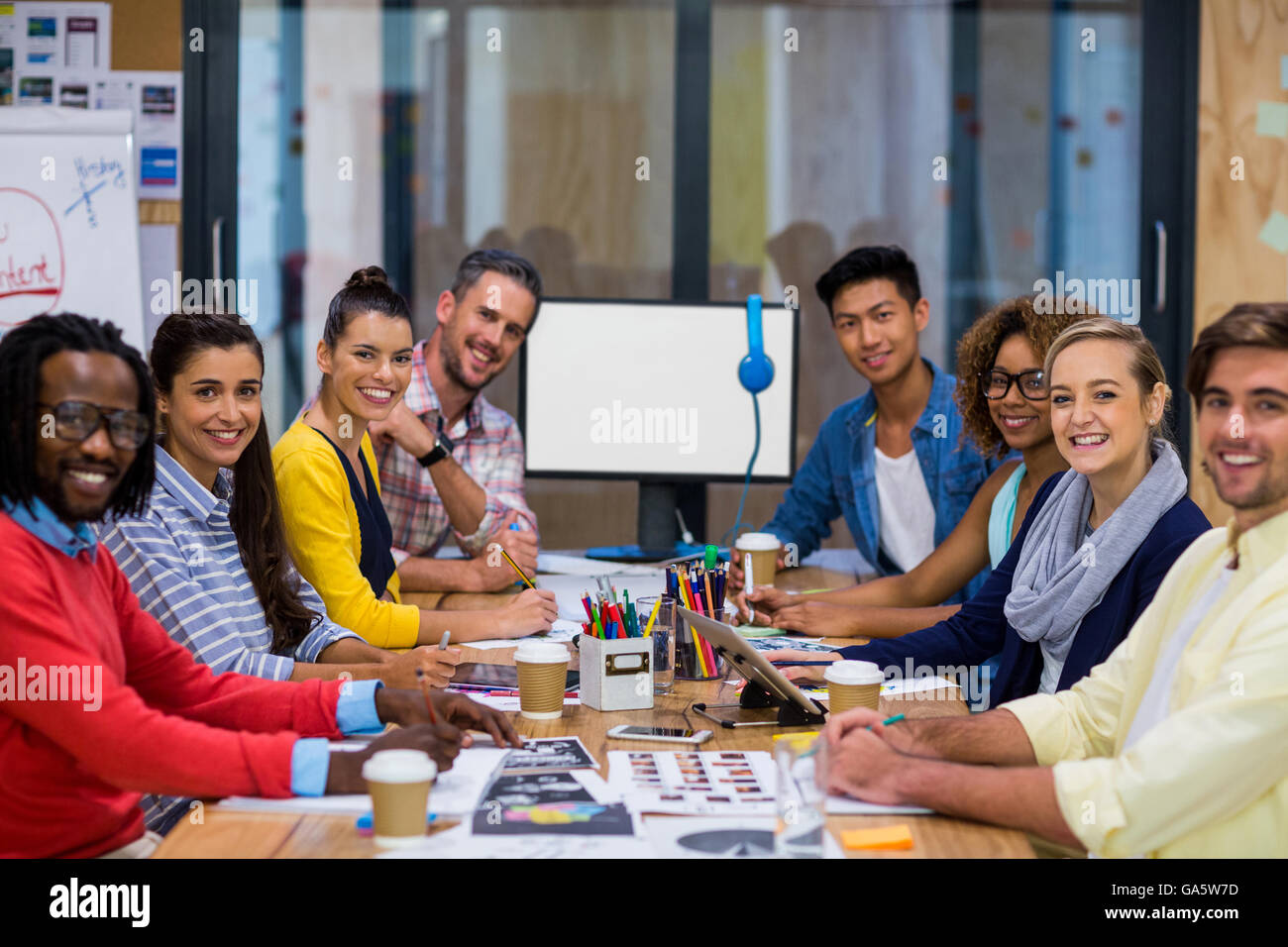 Young colleagues in meeting room Stock Photo - Alamy