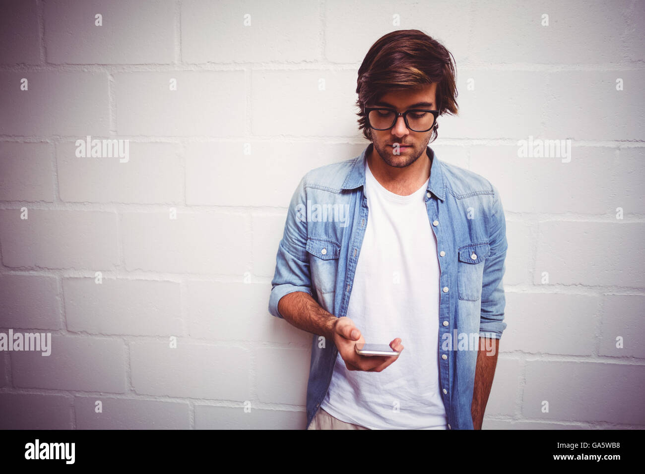 Man standing using phone hi-res stock photography and images - Alamy