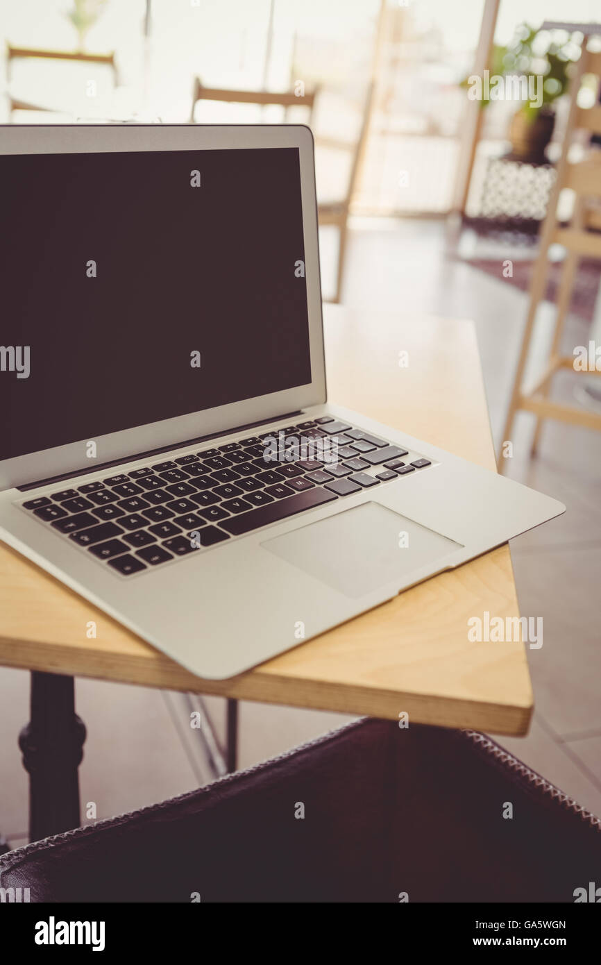 Close-up of laptop on a table Stock Photo - Alamy