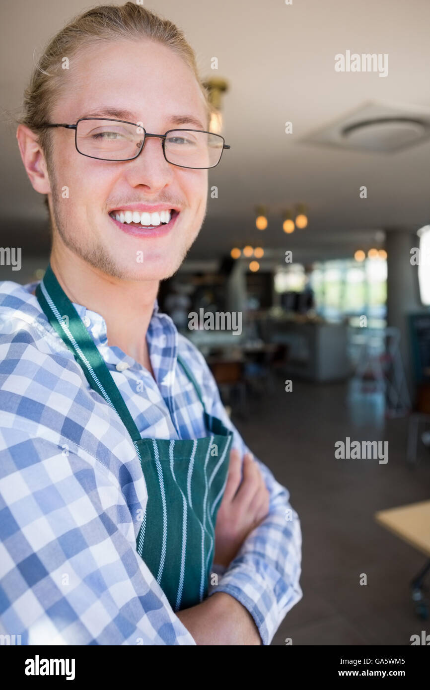 Portrait of waiter smiling Stock Photo - Alamy