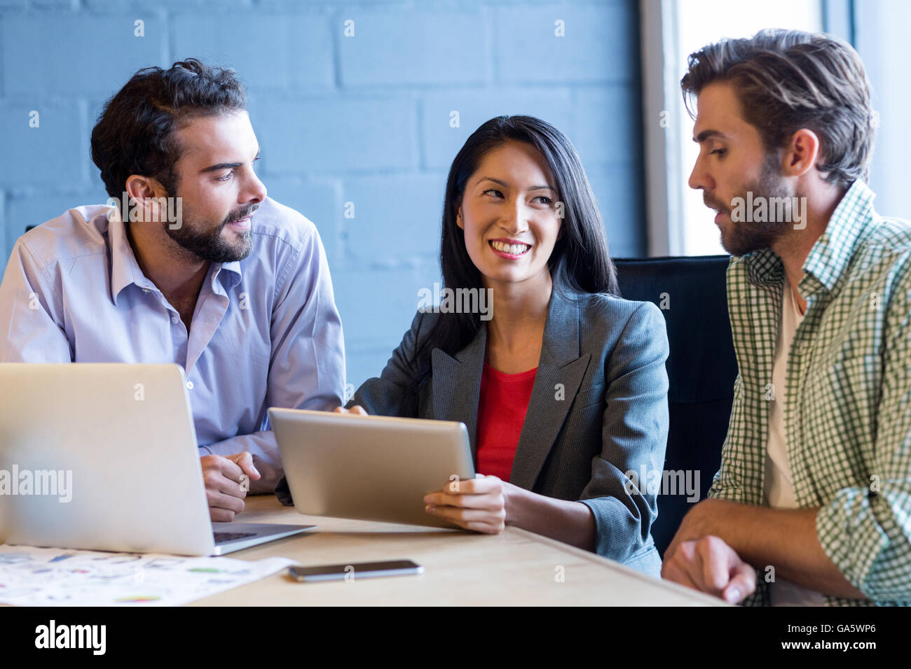 Colleagues using hi-res stock photography and images - Alamy