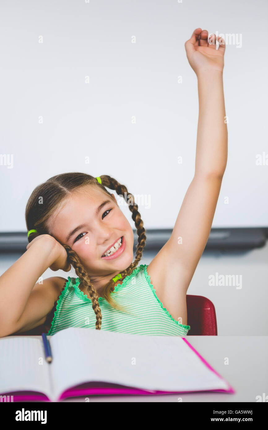 Child raising hand classroom hi-res stock photography and images - Alamy