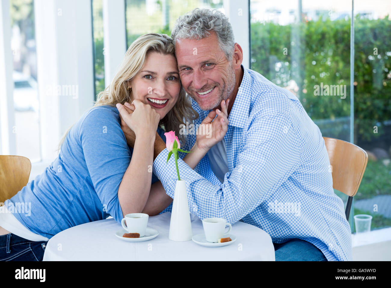 Portrait of romantic couple in restaurant Stock Photo - Alamy