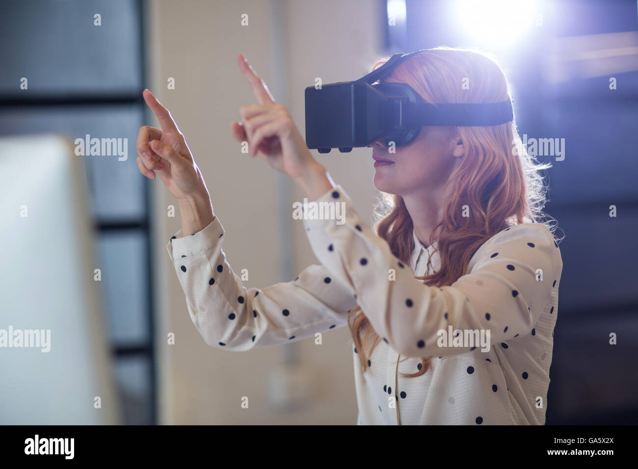 Woman wearing virtual reality glass Stock Photo - Alamy