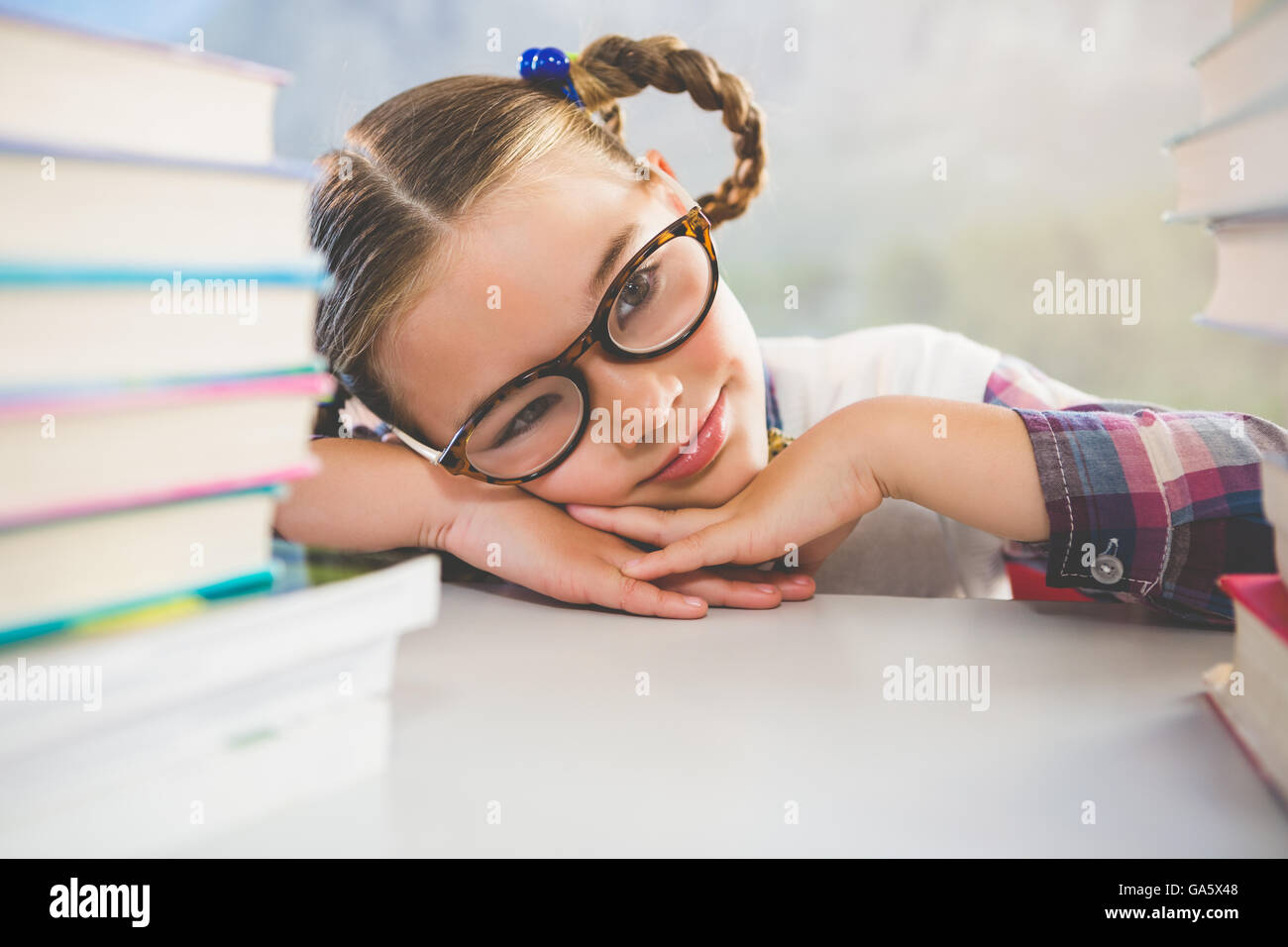 Girl leaning on desk hi-res stock photography and images - Alamy