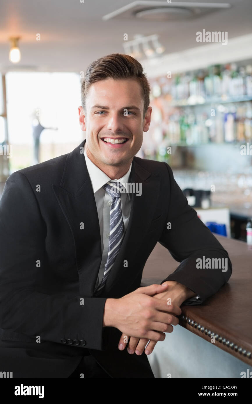 Portrait of businessman smiling Stock Photo - Alamy