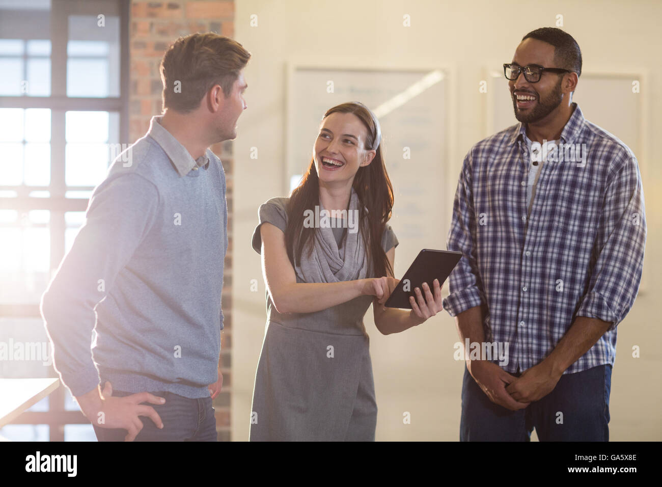 Happy colleagues in smart hi-res stock photography and images - Alamy