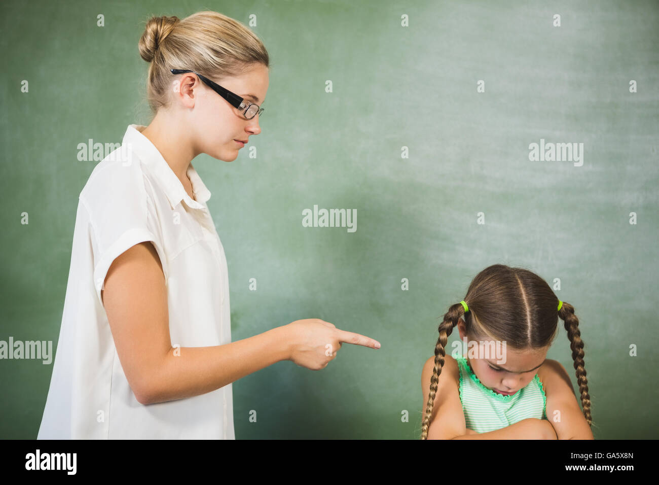 Teacher scolding student hi-res stock photography and images - Alamy