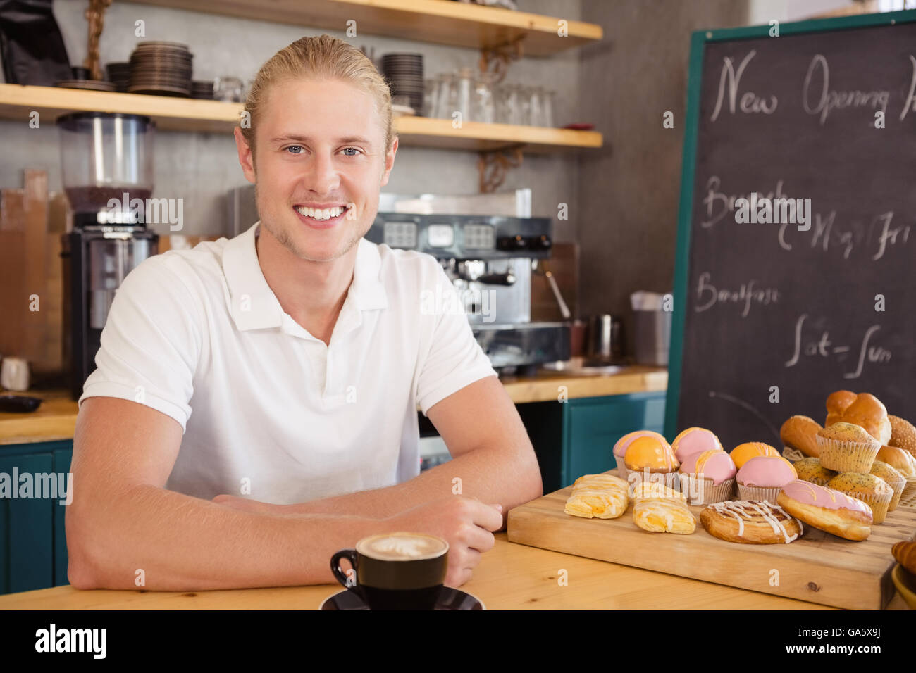 Portrait of waiter smiling Stock Photo - Alamy