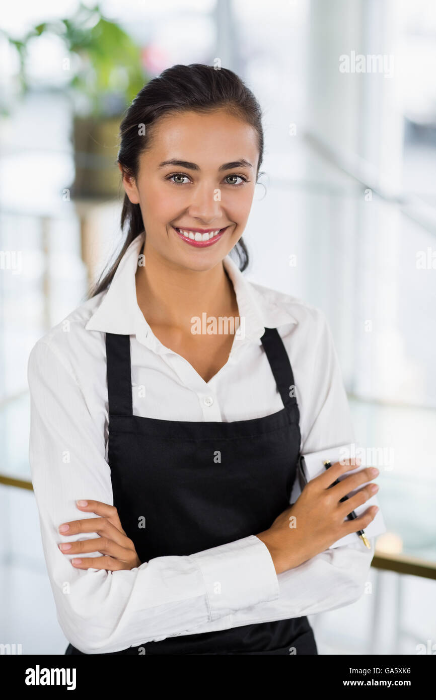 Portrait waitress standing arms hi-res stock photography and images - Alamy