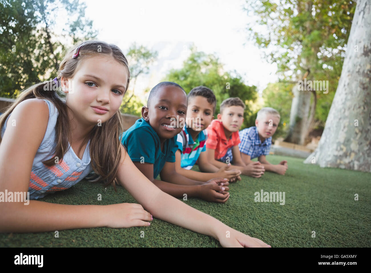 Male lying in grass hi-res stock photography and images - Alamy