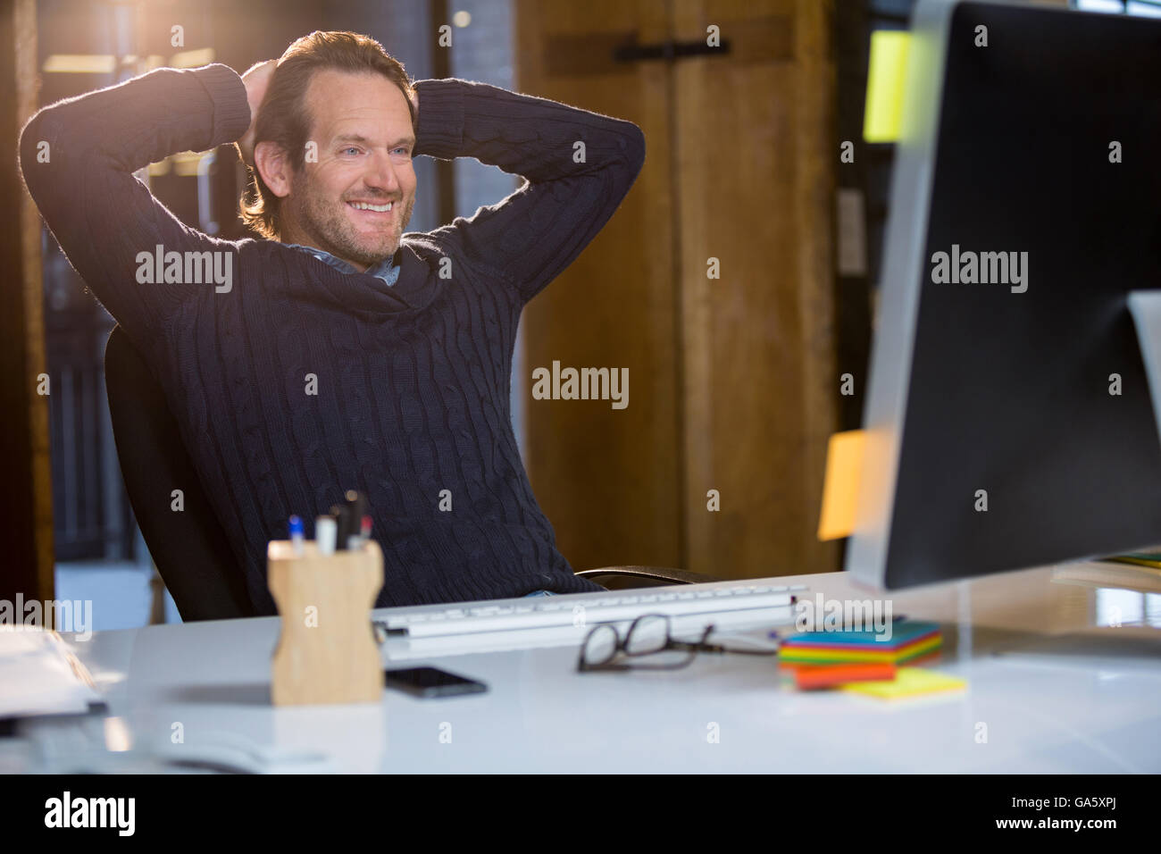 Shot man behind computer hi-res stock photography and images - Alamy