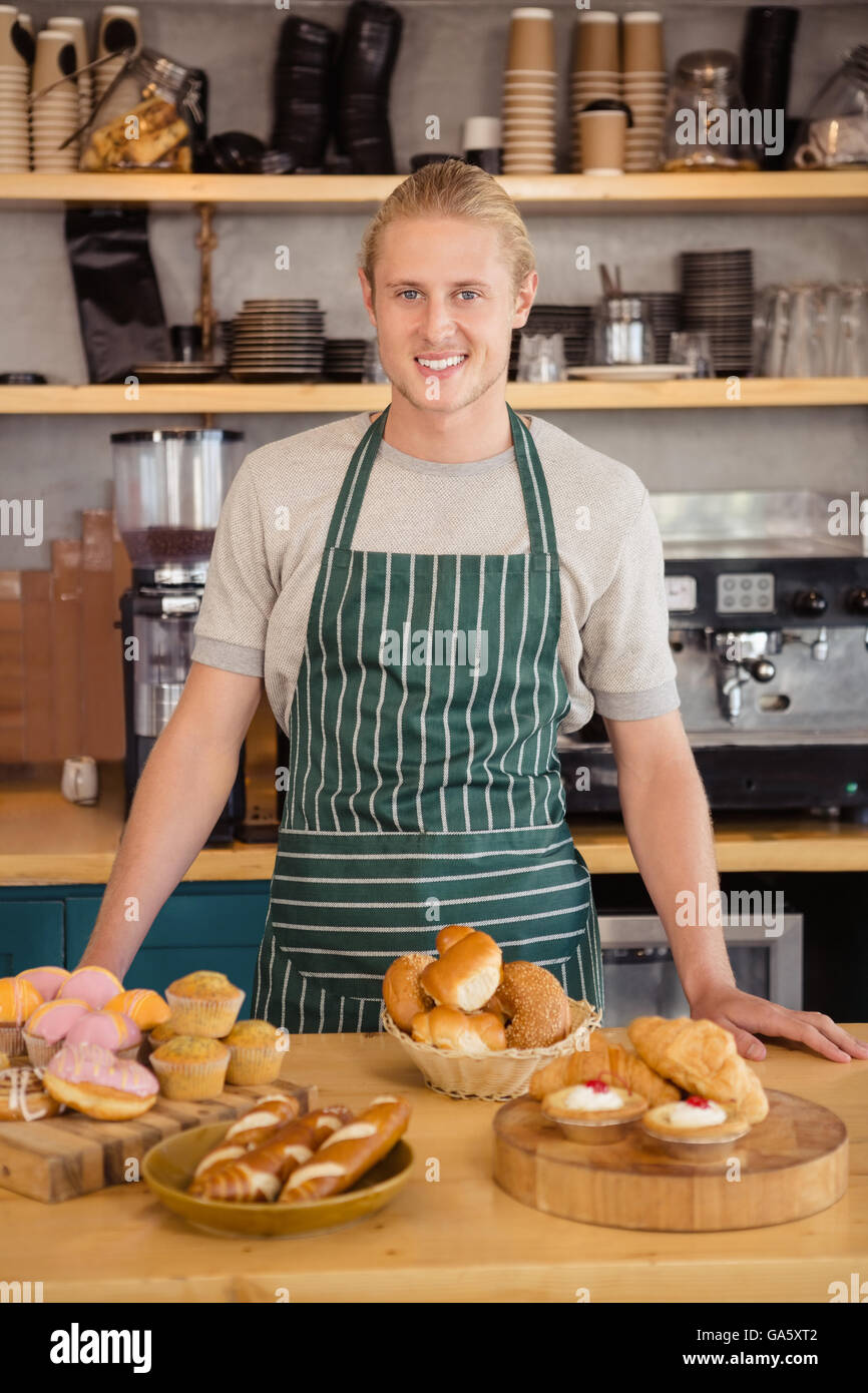 Portrait of waiter smiling Stock Photo - Alamy