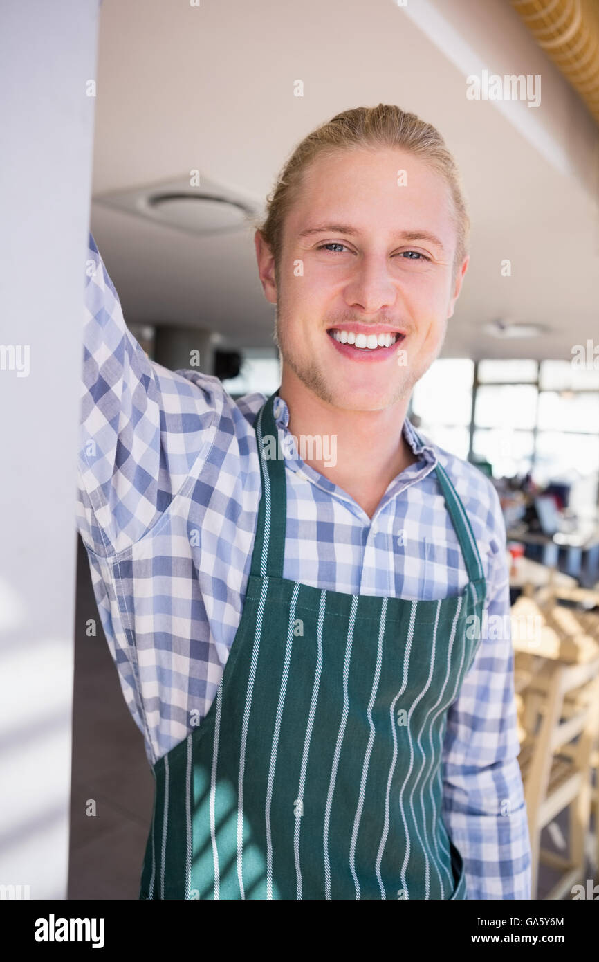 Portrait of waiter smiling Stock Photo - Alamy