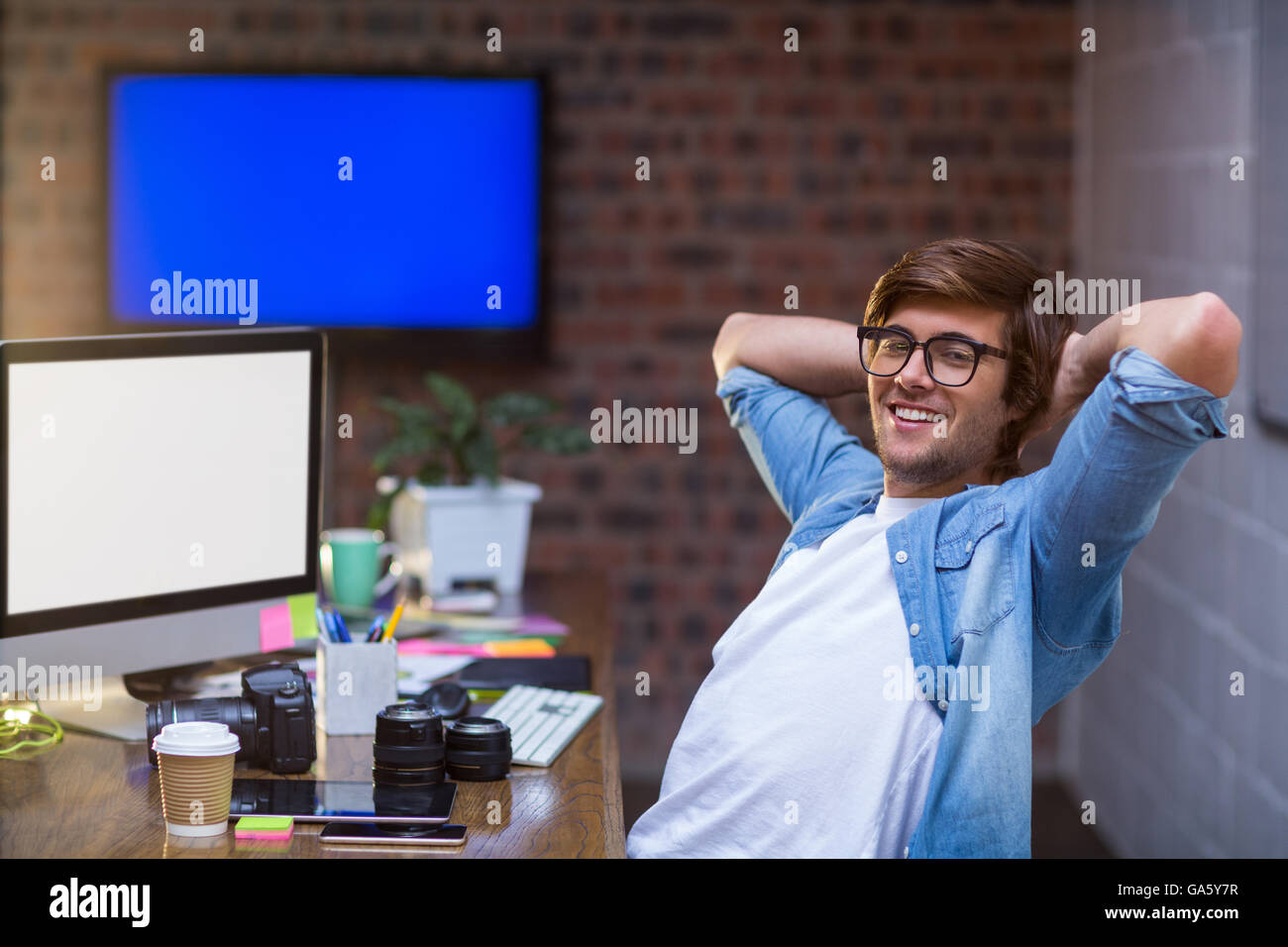 Relaxed office professional hi-res stock photography and images - Alamy