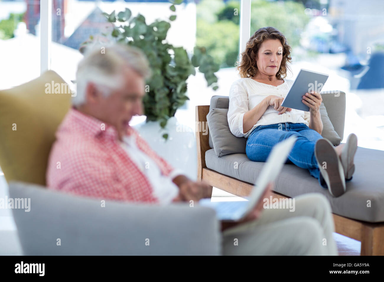 Female relaxing on seat hi-res stock photography and images - Alamy