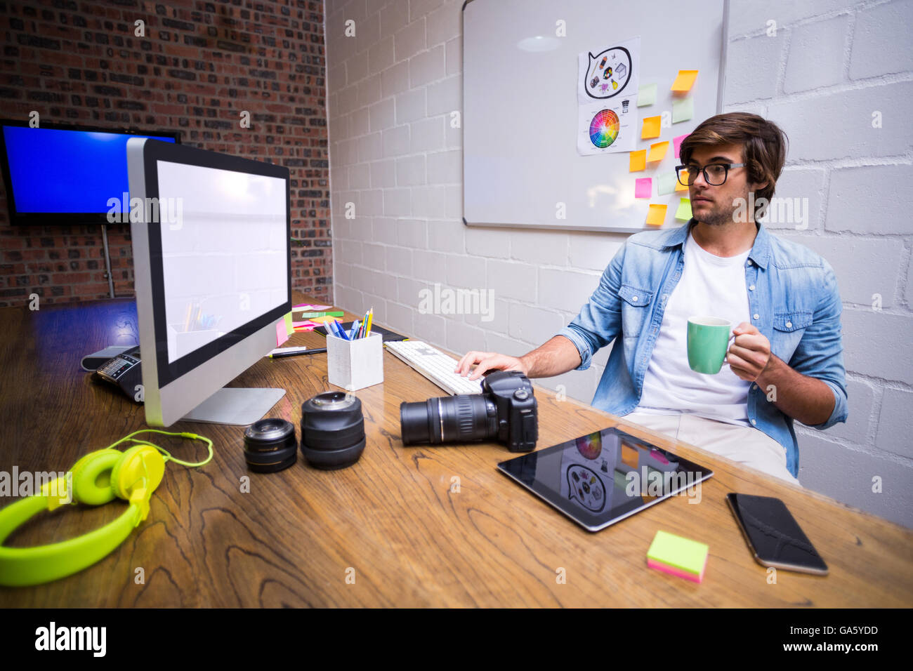 Man using computer in office Stock Photo - Alamy
