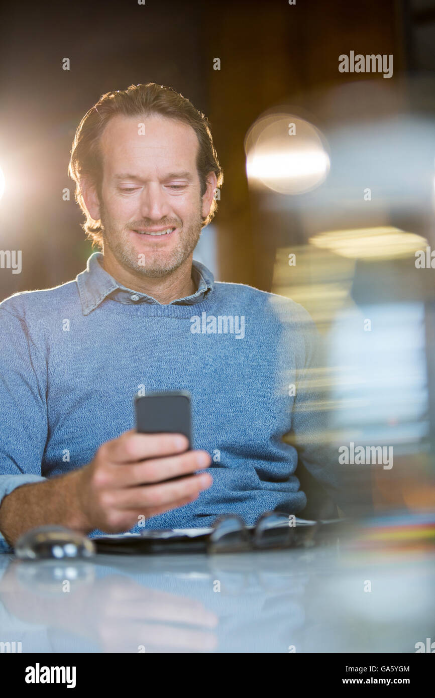 Mature adult phone desk hi-res stock photography and images - Alamy