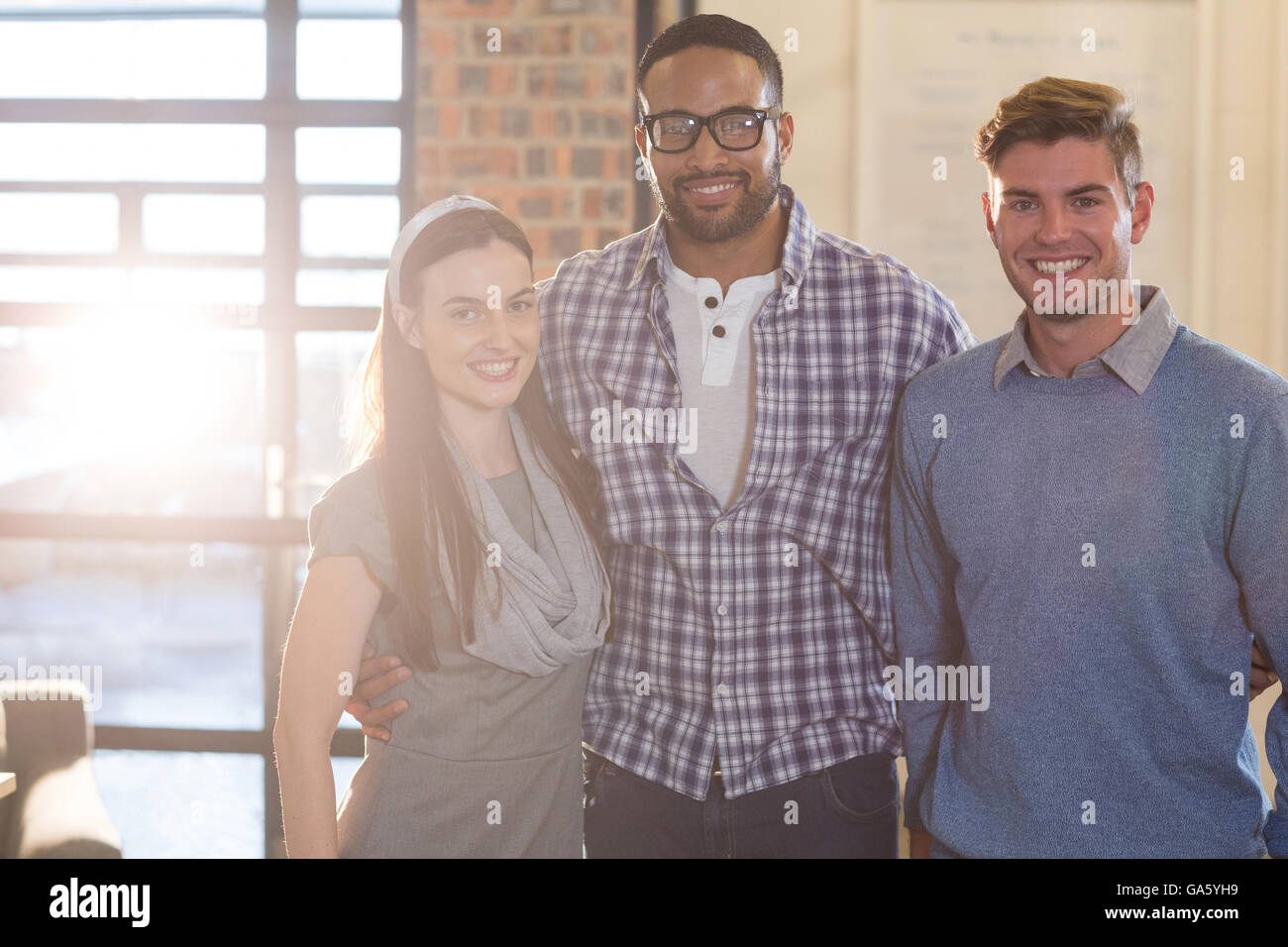 Happy colleagues in smart hi-res stock photography and images - Alamy