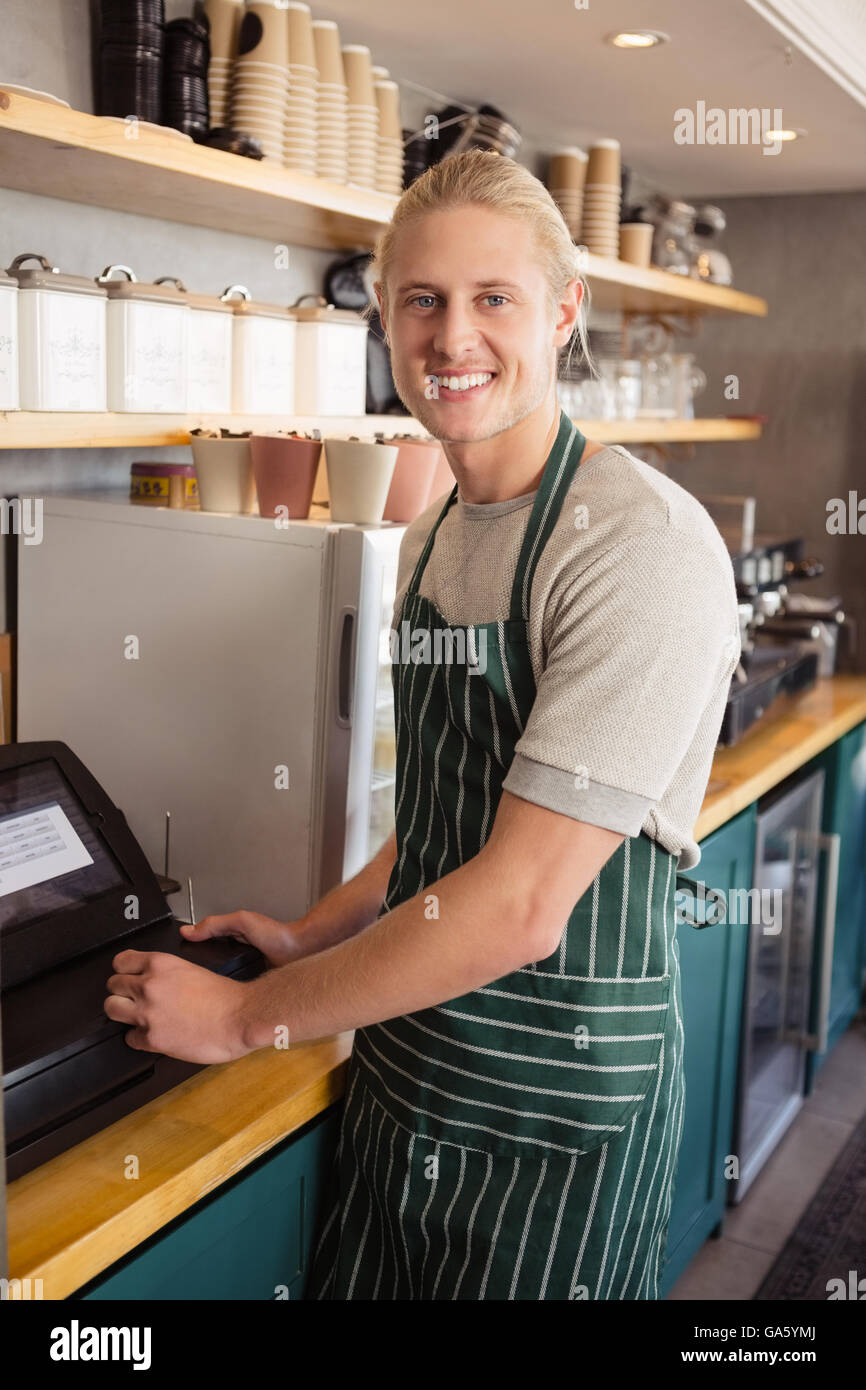 Portrait of waiter smiling Stock Photo - Alamy