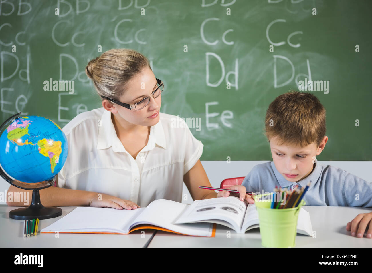 Woman teacher boy student hi-res stock photography and images - Alamy