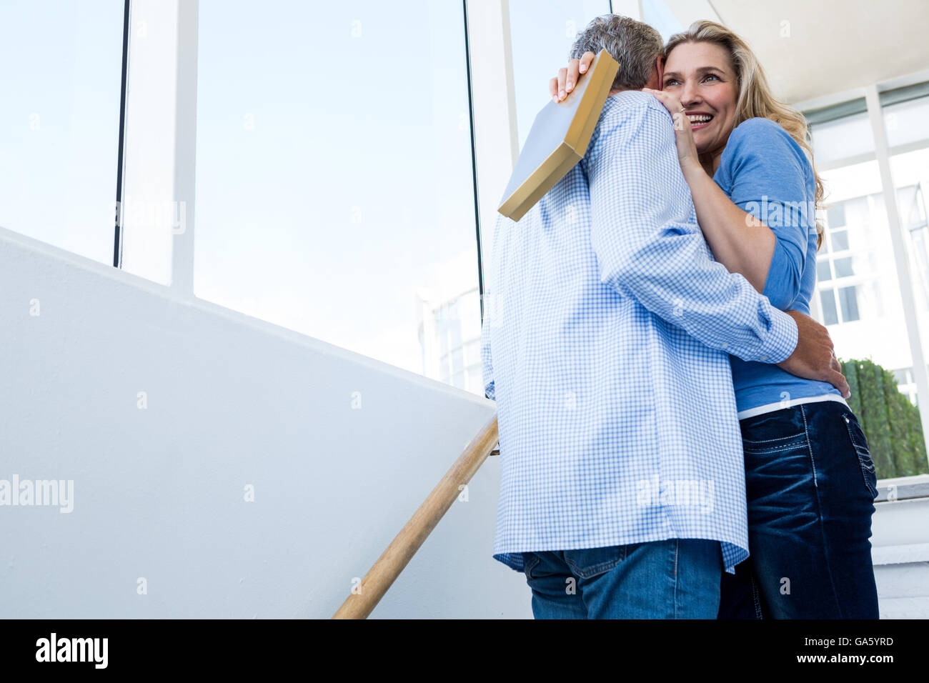Man woman standing on steps hi-res stock photography and images - Alamy