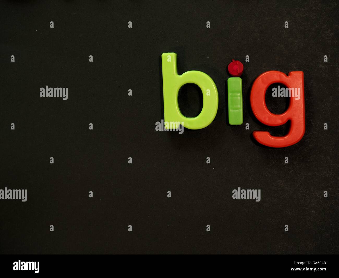 BIG on black background Stock Photo - Alamy