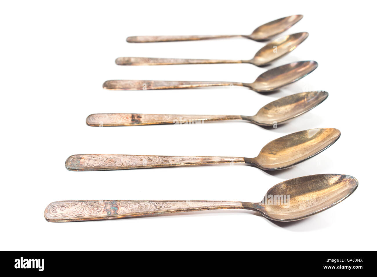 Vintage silver tea spoons isolated on white Stock Photo - Alamy