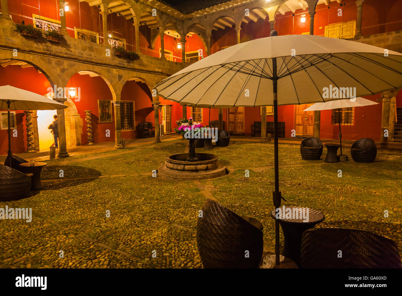 Night image of the columns and courtyard of the Picoaga mansion in ...