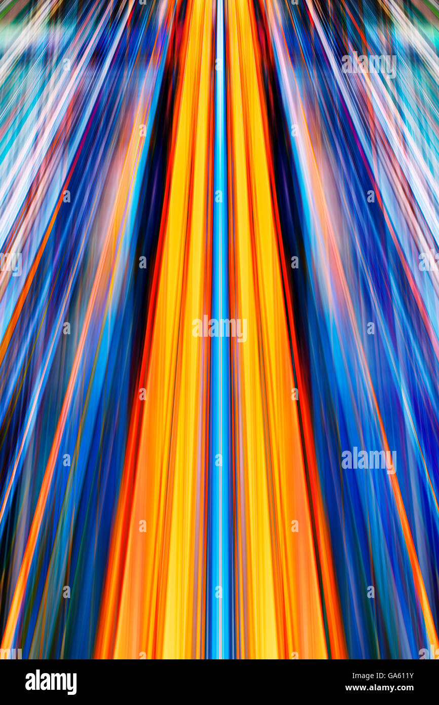 Dynamic yellow and blue light beams background Stock Photo - Alamy