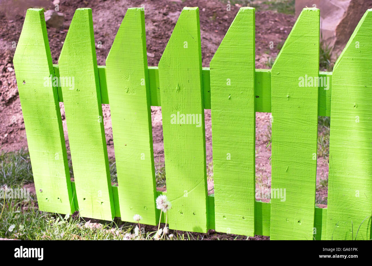 Yellow wooden fence Stock Photo - Alamy