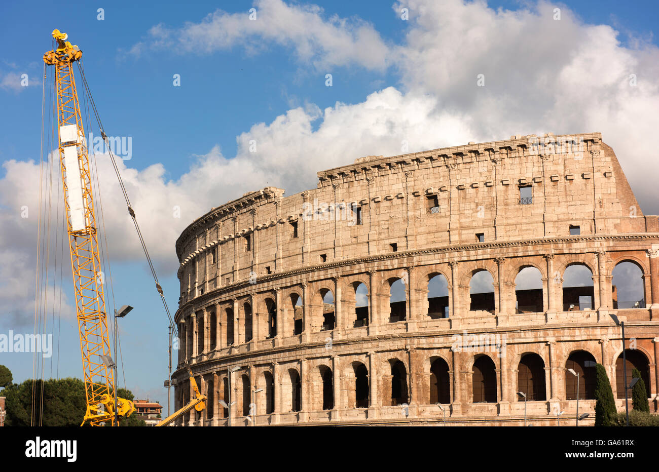 Rome's Coliseum alongside a modern crane used for construction Stock ...