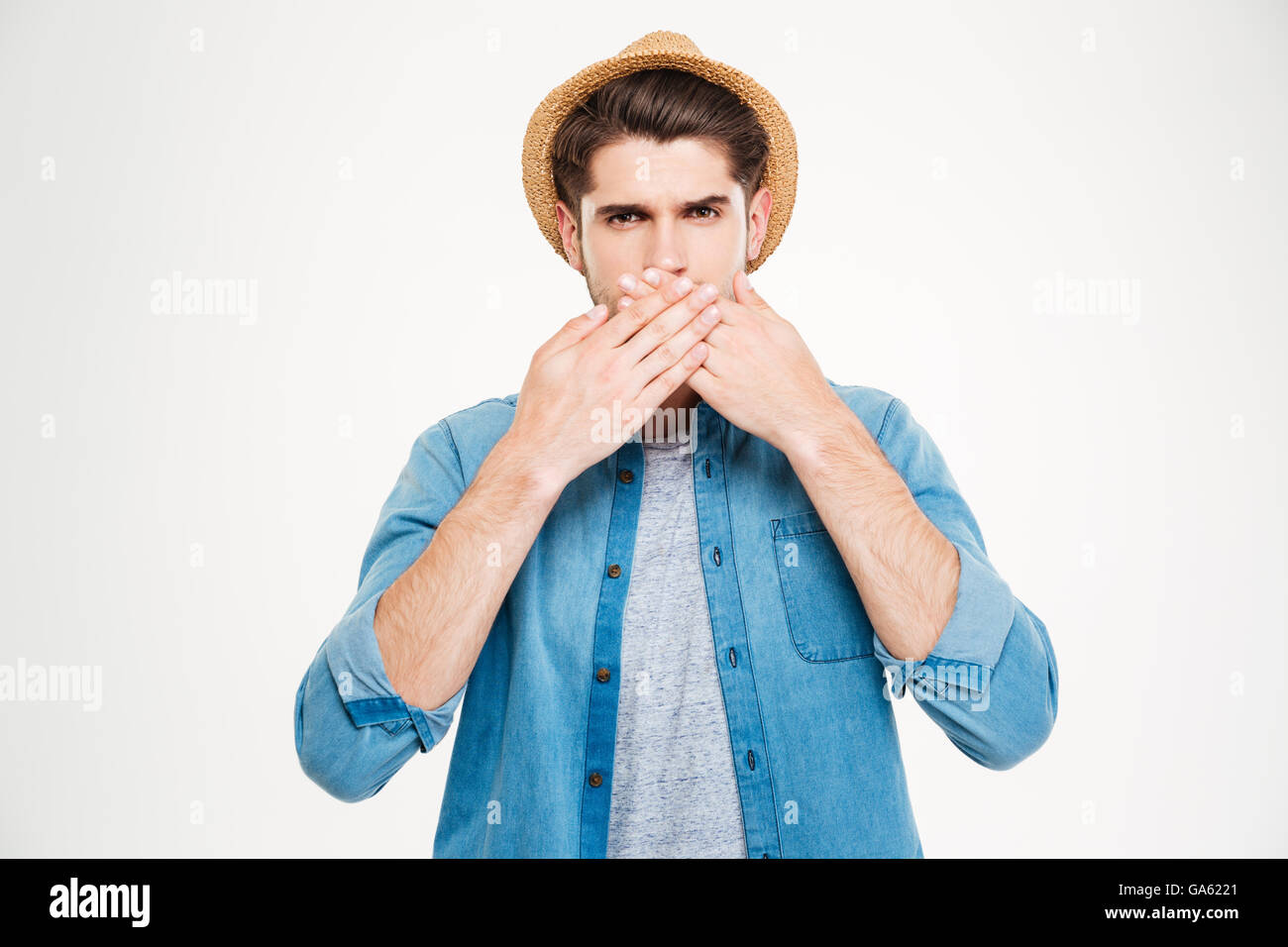 Covered hands over mouth hi-res stock photography and images - Alamy