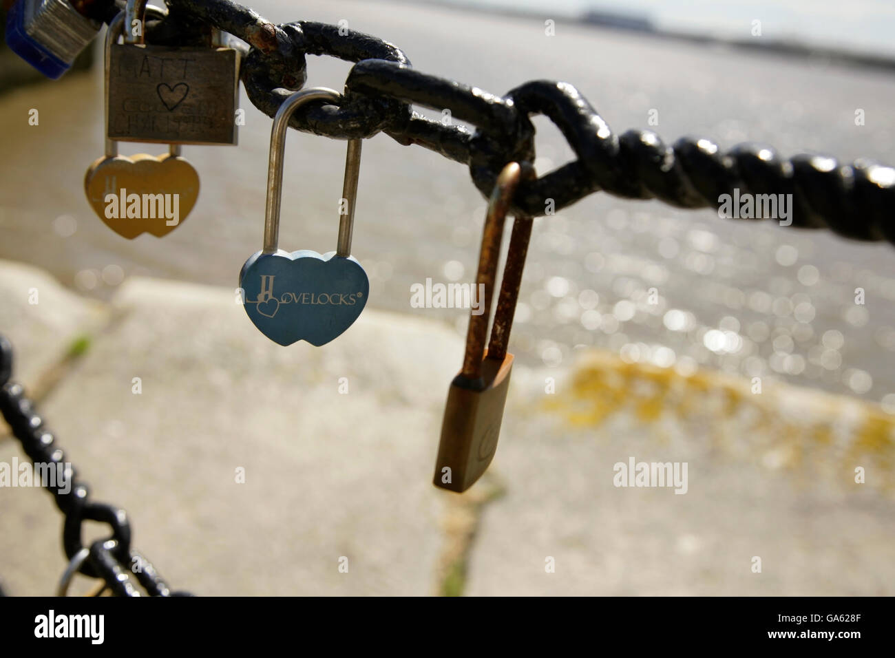 Love padlocks on riverside railings hi-res stock photography and images ...