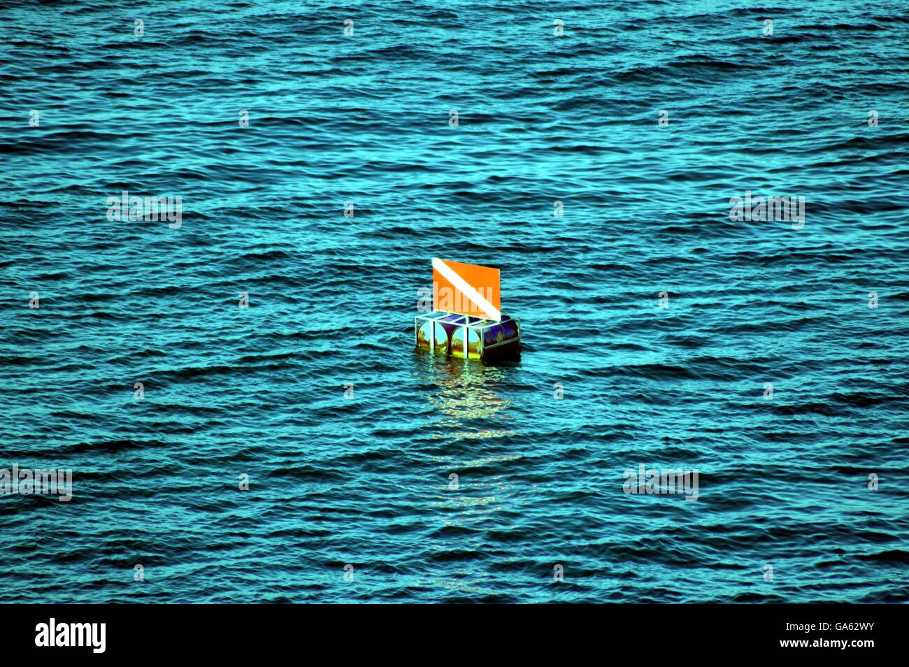 Maritime road sign on the ocean with barrels Stock Photo - Alamy