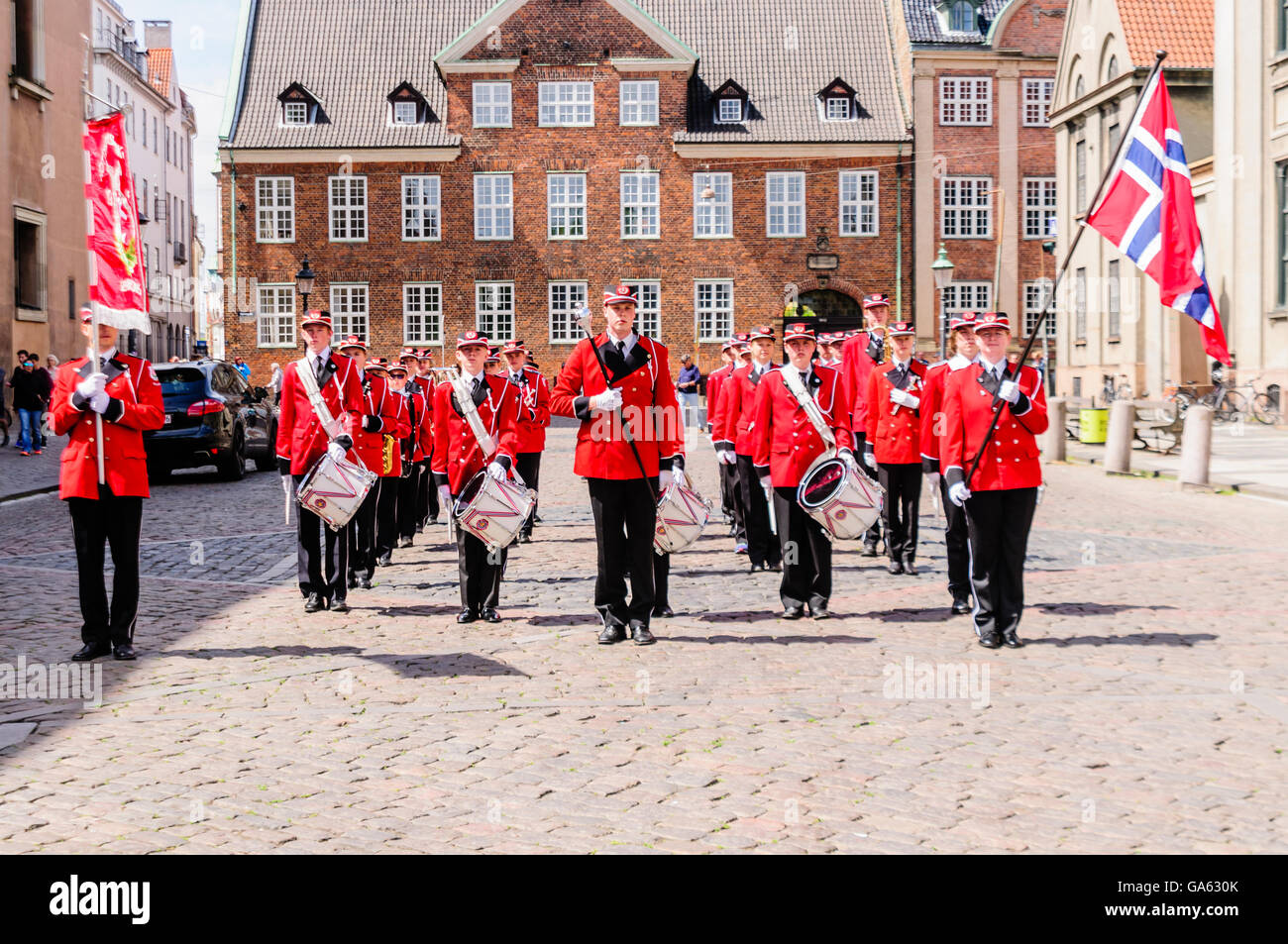 Marching band carrying a Danish Flag perform in Copenhagen Stock Photo ...