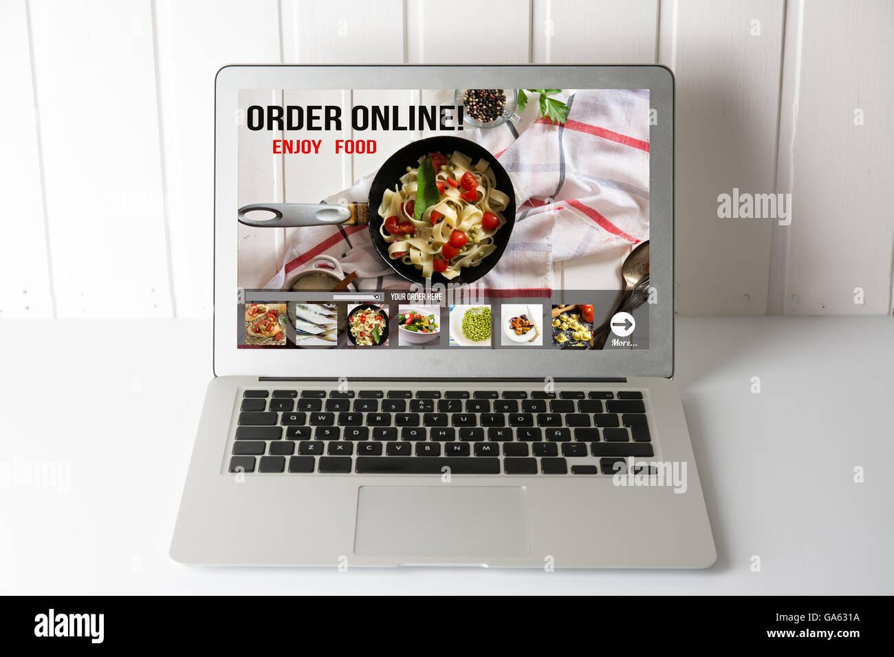 Computer With Online Food Delivery app on screen, on the desk, Healthy ...