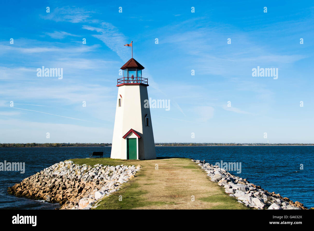 lighthouse on jetty Stock Photo - Alamy